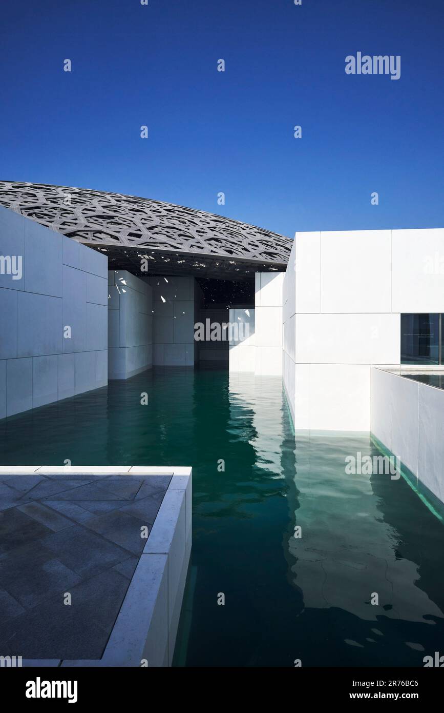 Water feature, walkways, passages on exterior of museum. Louvre Abu ...
