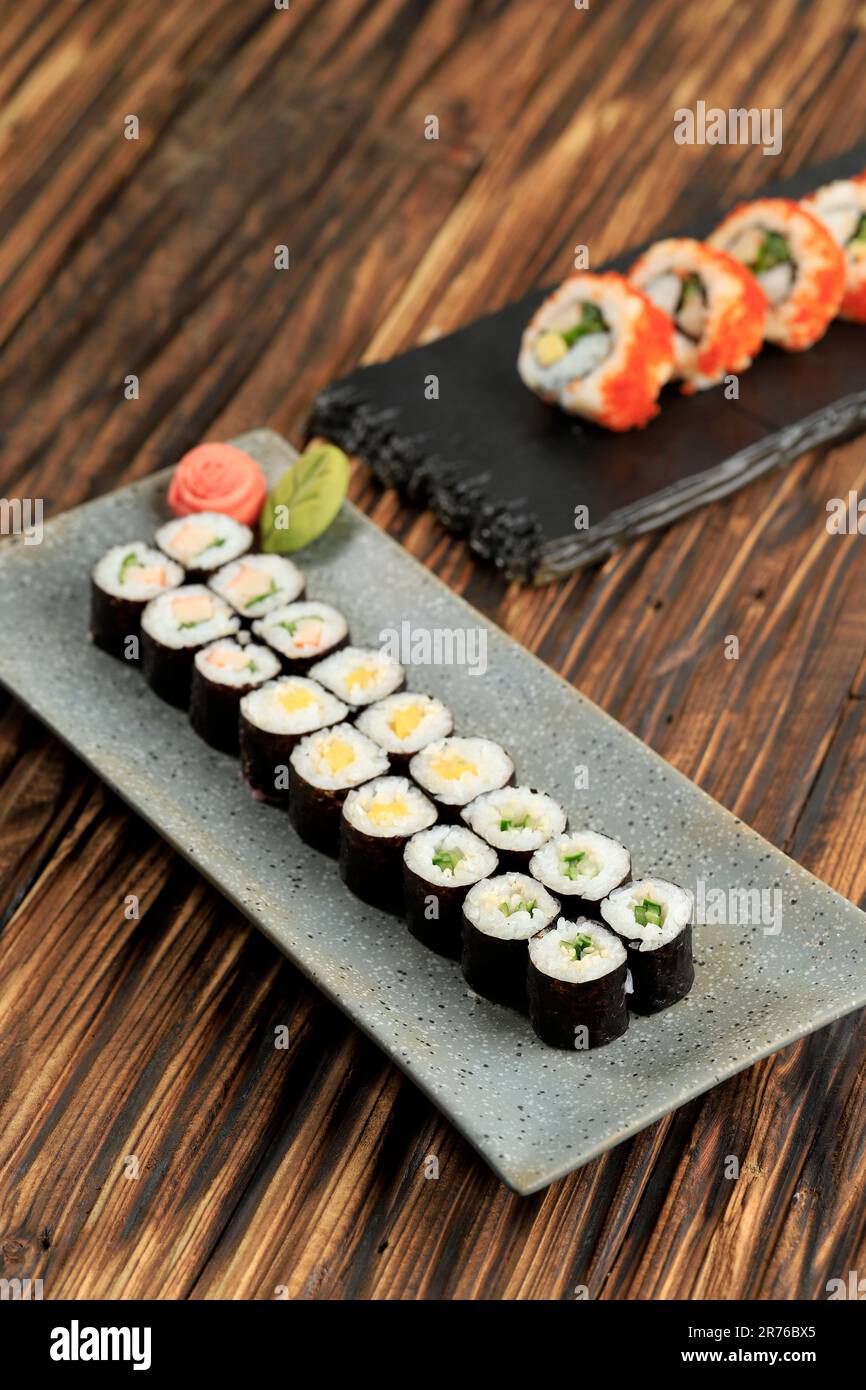 Mini Maki Sushi Platter on Grey Plate Stock Photo - Alamy