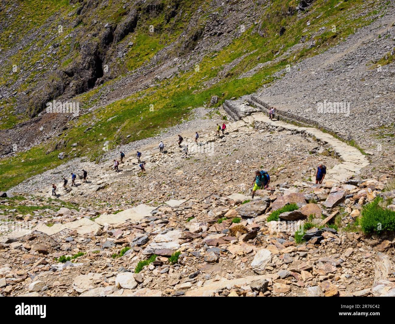Walkers ascending and descending the Pyg Track a popular route towards ...