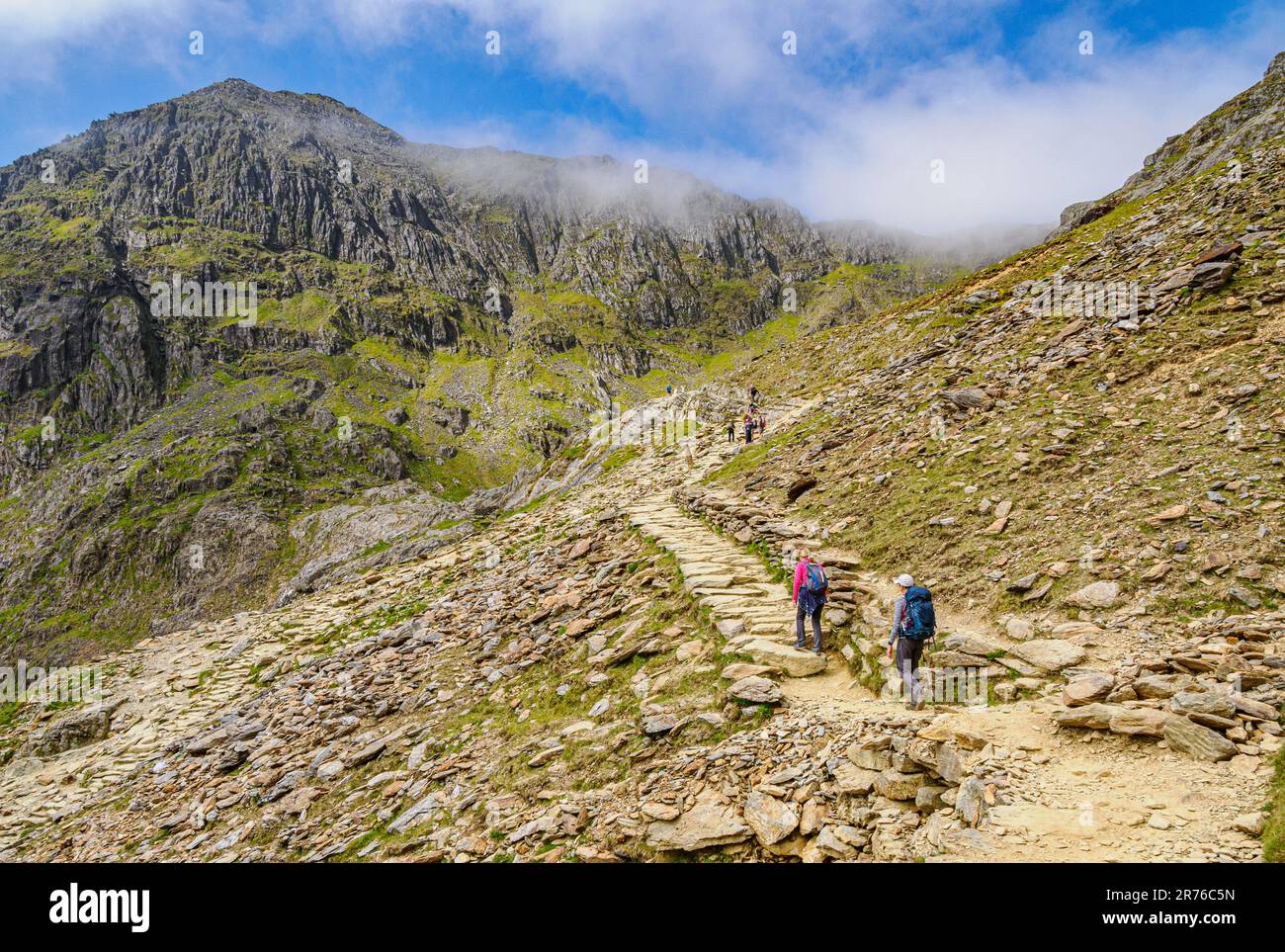 Walkers ascending the Pyg Track a popular route towards the summit ...