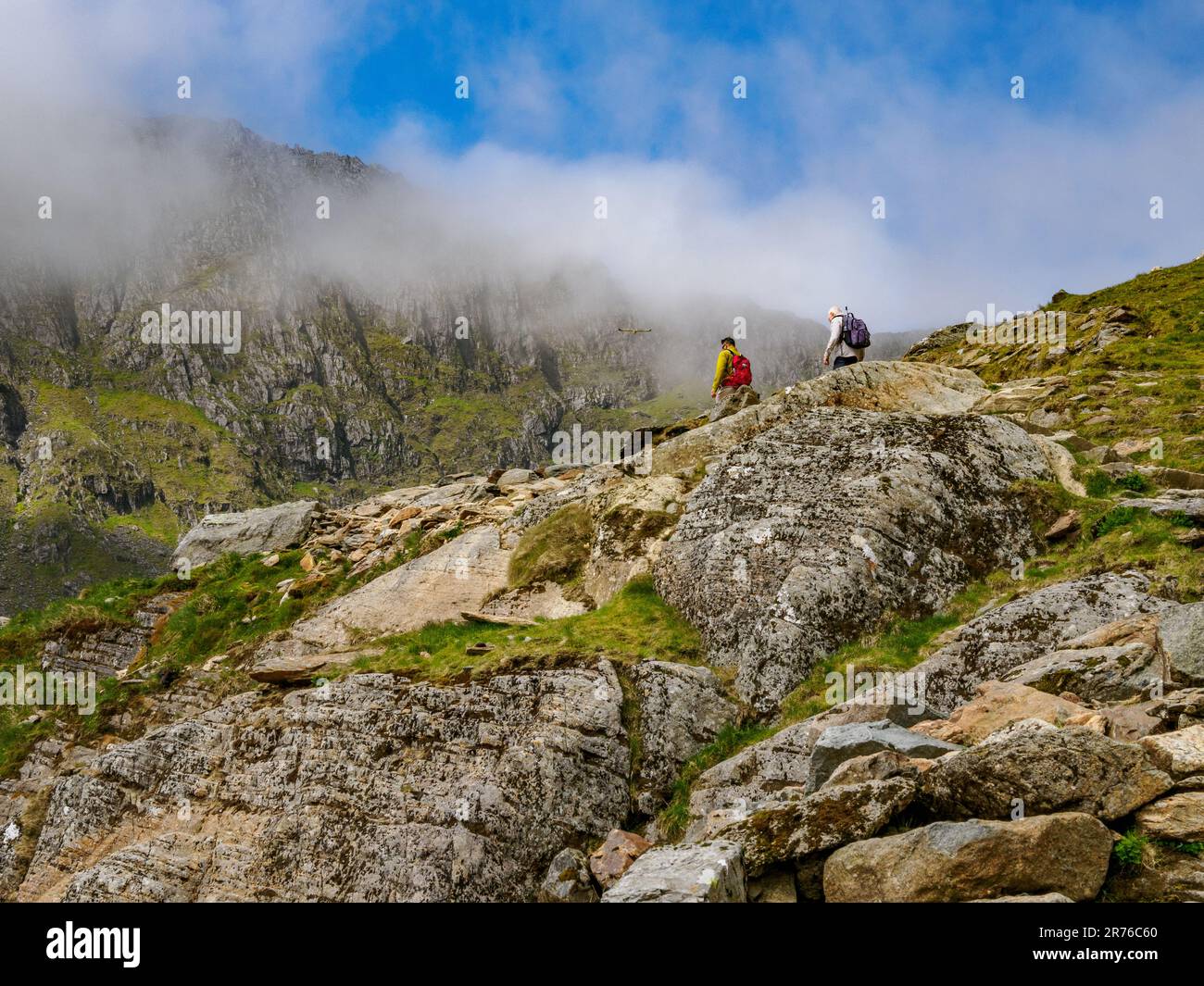 Walkers ascending the Pyg Track a popular route towards the summit ...