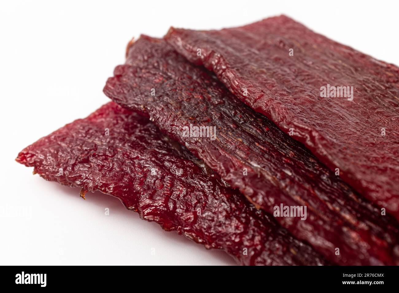 Beef jerky on a white background Stock Photo - Alamy
