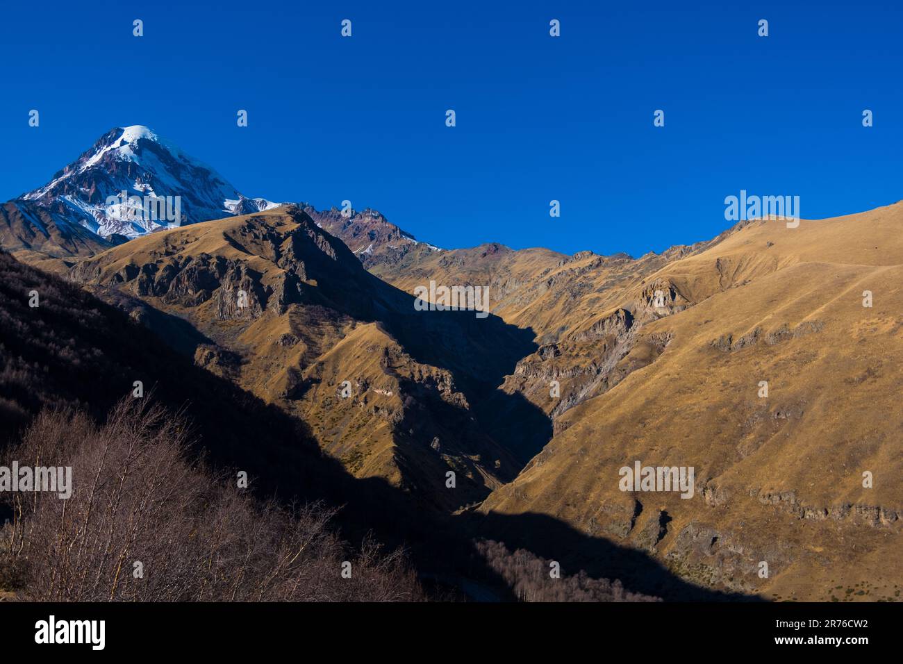 A majestic view of Stepantsminda and Kazbegi mountain in Georgia Stock ...