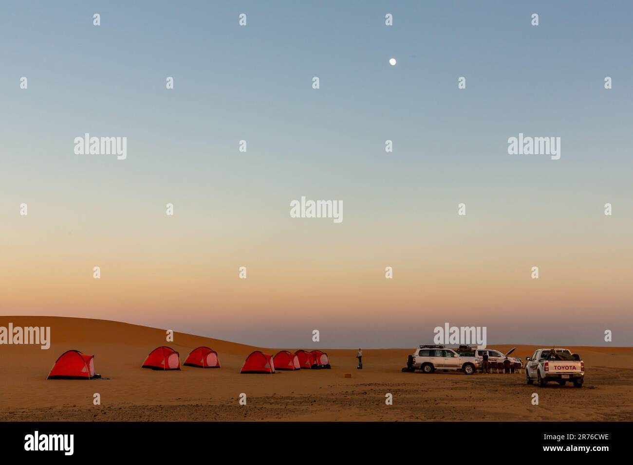 wild camping in the desert in sudan a cluster of small orange tents in ...