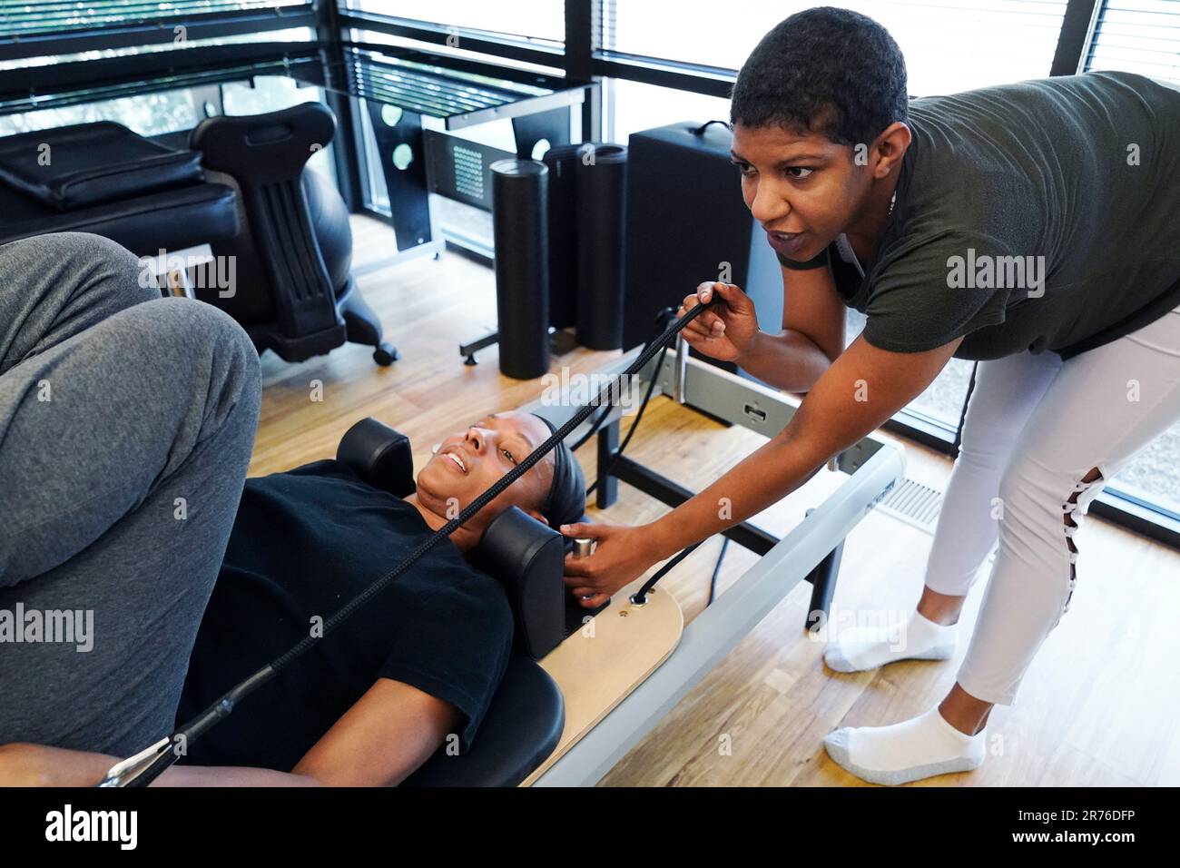 Healthcare instructor Aolion Doxie, right, works with Jamila Thomas ...