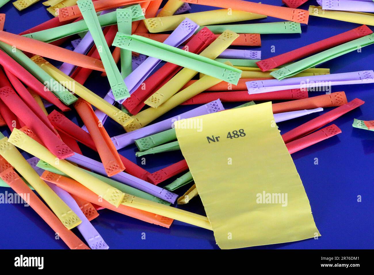 A blue table covered with a vibrant display of post-it notes Stock ...