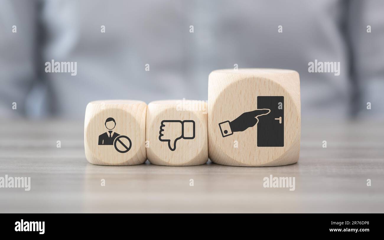 Wooden blocks with symbol of job loss concept Stock Photo - Alamy