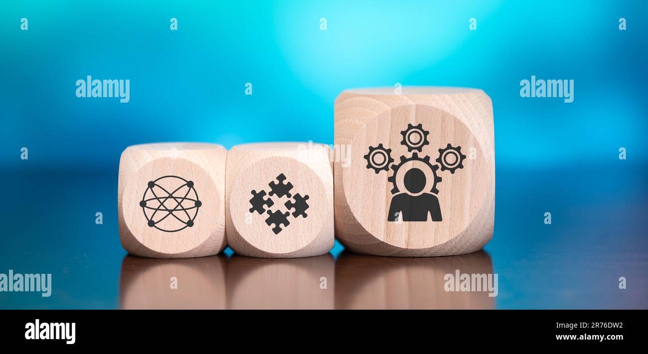 Wooden blocks with symbol of competence concept on blue background ...
