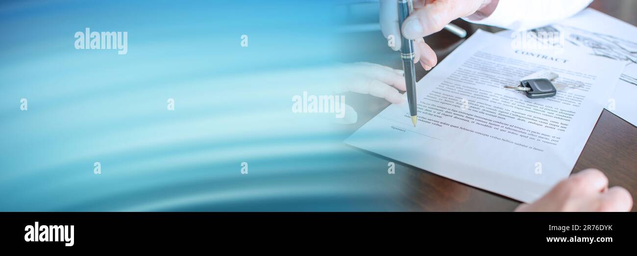 Dealer showing the signature place of a contract with his pen ...