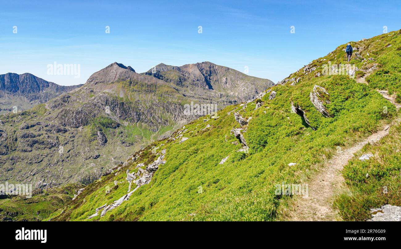 Walker ascending Glyder Fawr in the Snowdonia Eryri National Park in ...