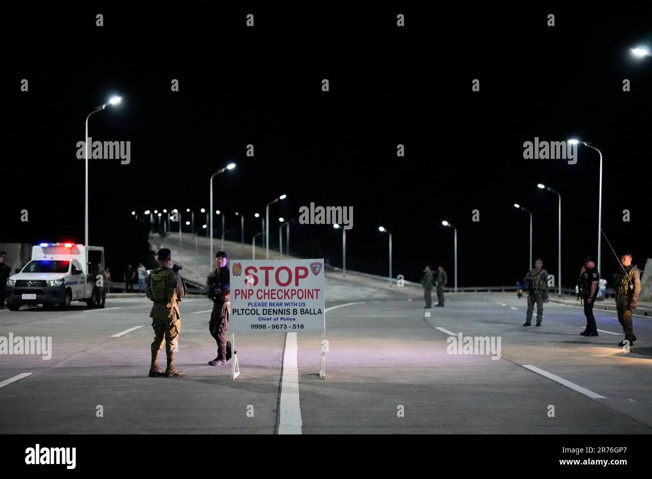 Police man a checkpoint at the border of the "permanent danger zone" at ...