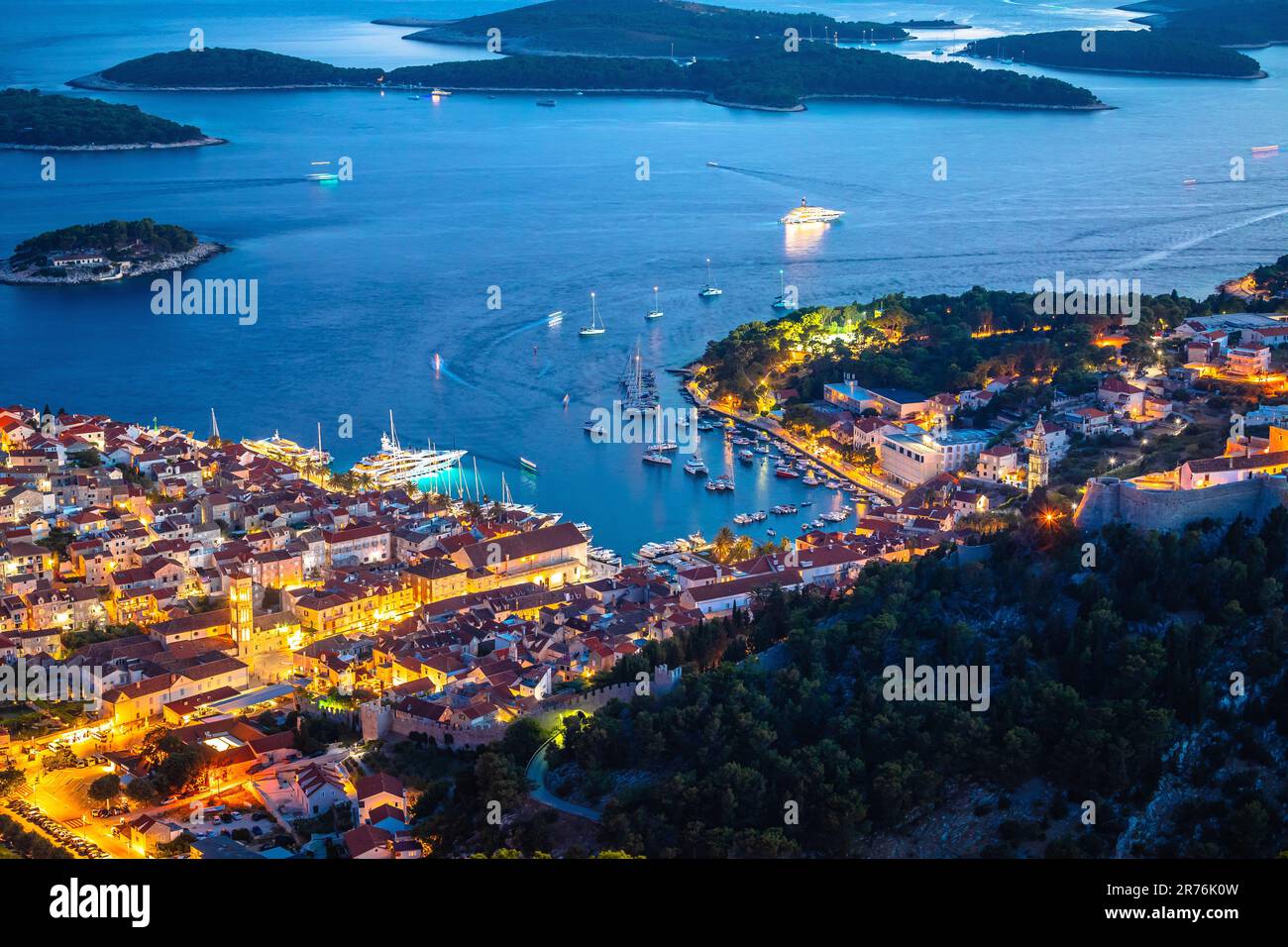 Aerial view of Hvar rooftops and harbor evening view, Dalmatia ...