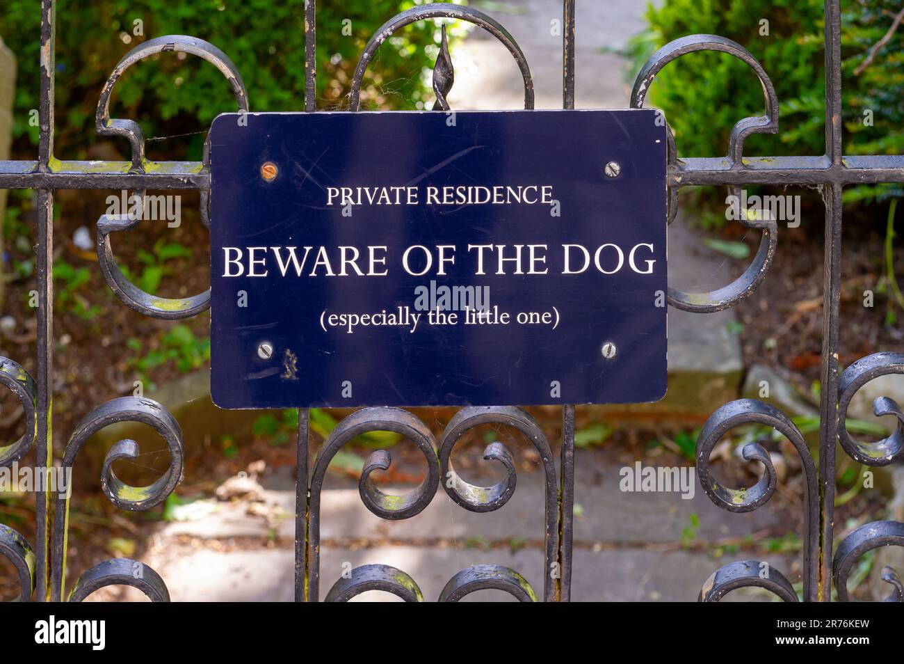 Funny Beware of the Dog sign Stock Photo - Alamy