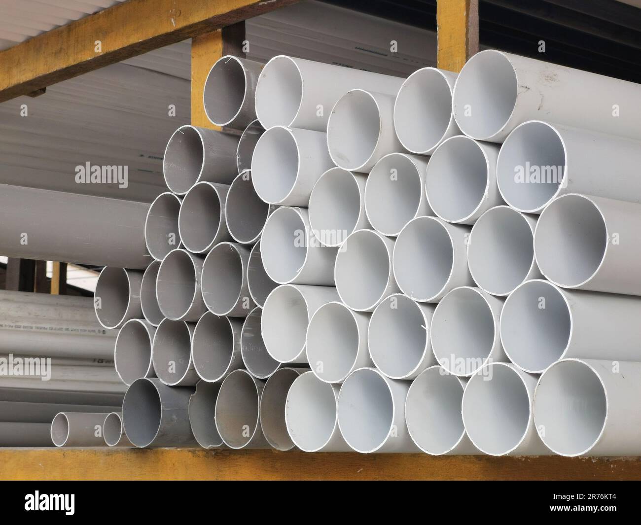 Various type and size pvc pipes stack on shelf Stock Photo - Alamy