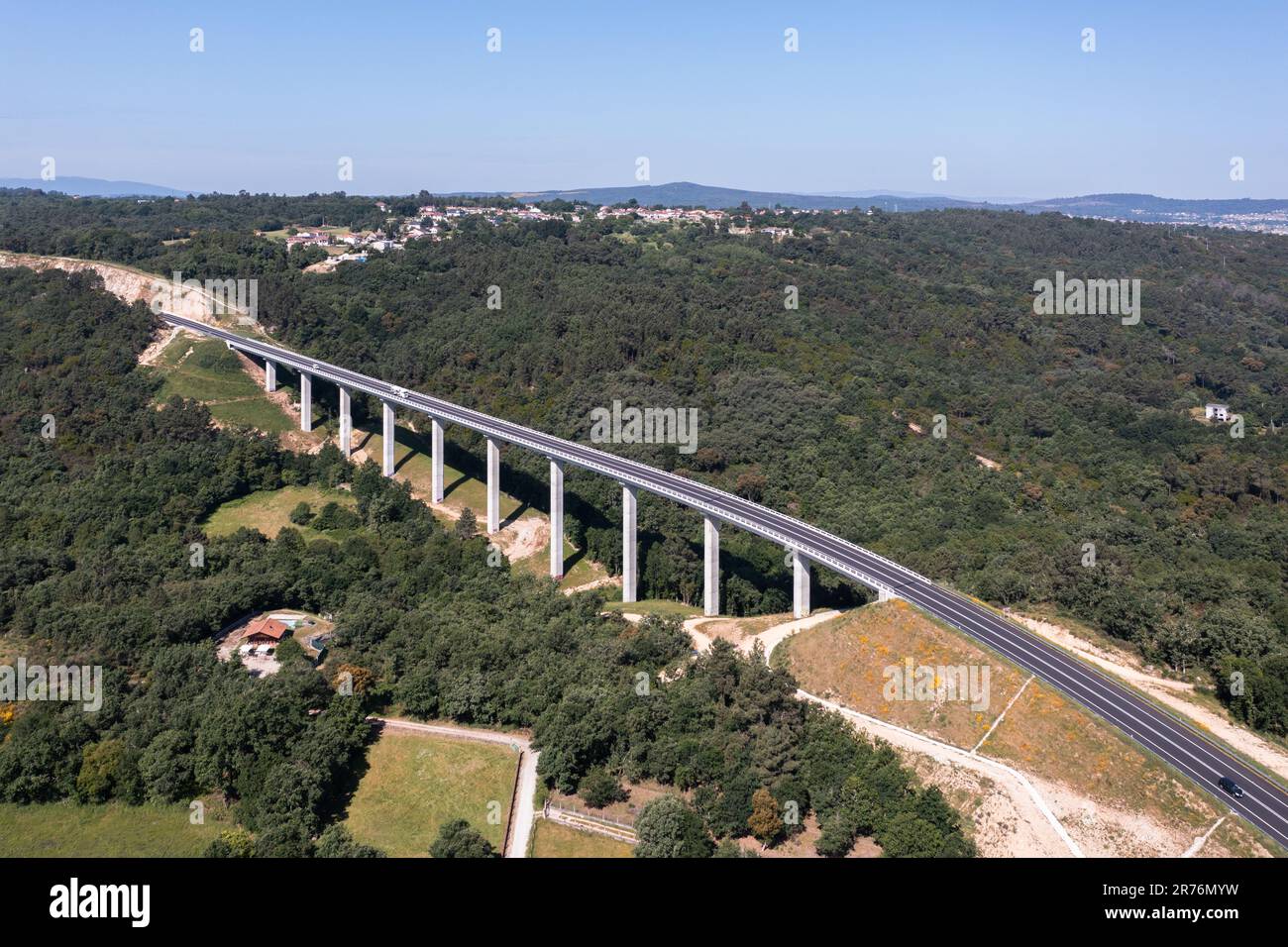 Aerial view of infrastructure development of road with lanes and bridge ...