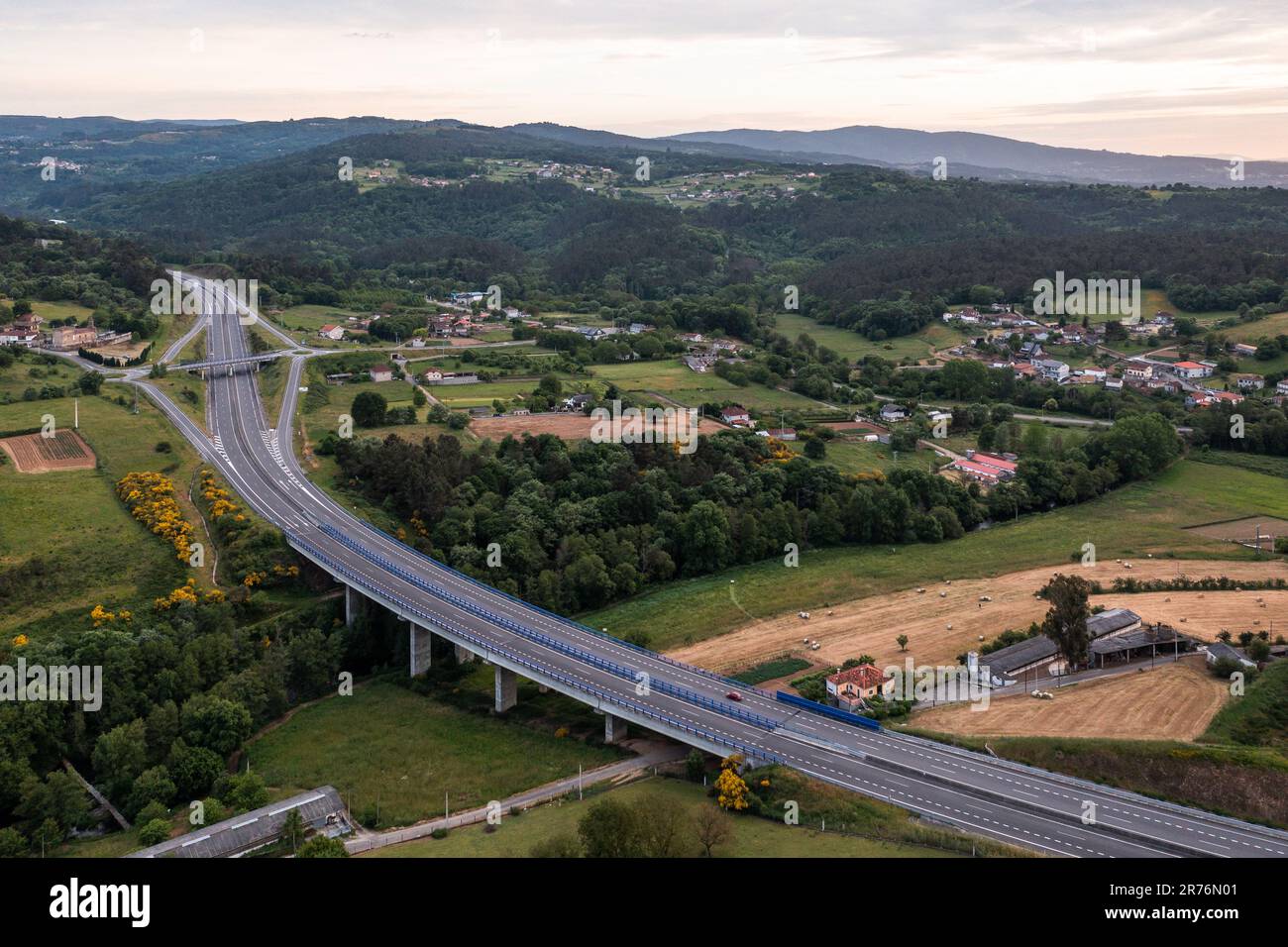 Aerial view of infrastructure development of road with lanes and bridge ...