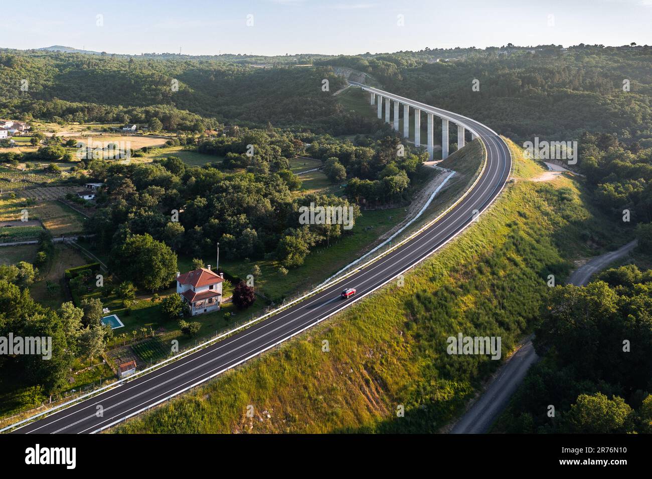Aerial view of highway road bridge for vehicular transport as part of infrastructure development ...
