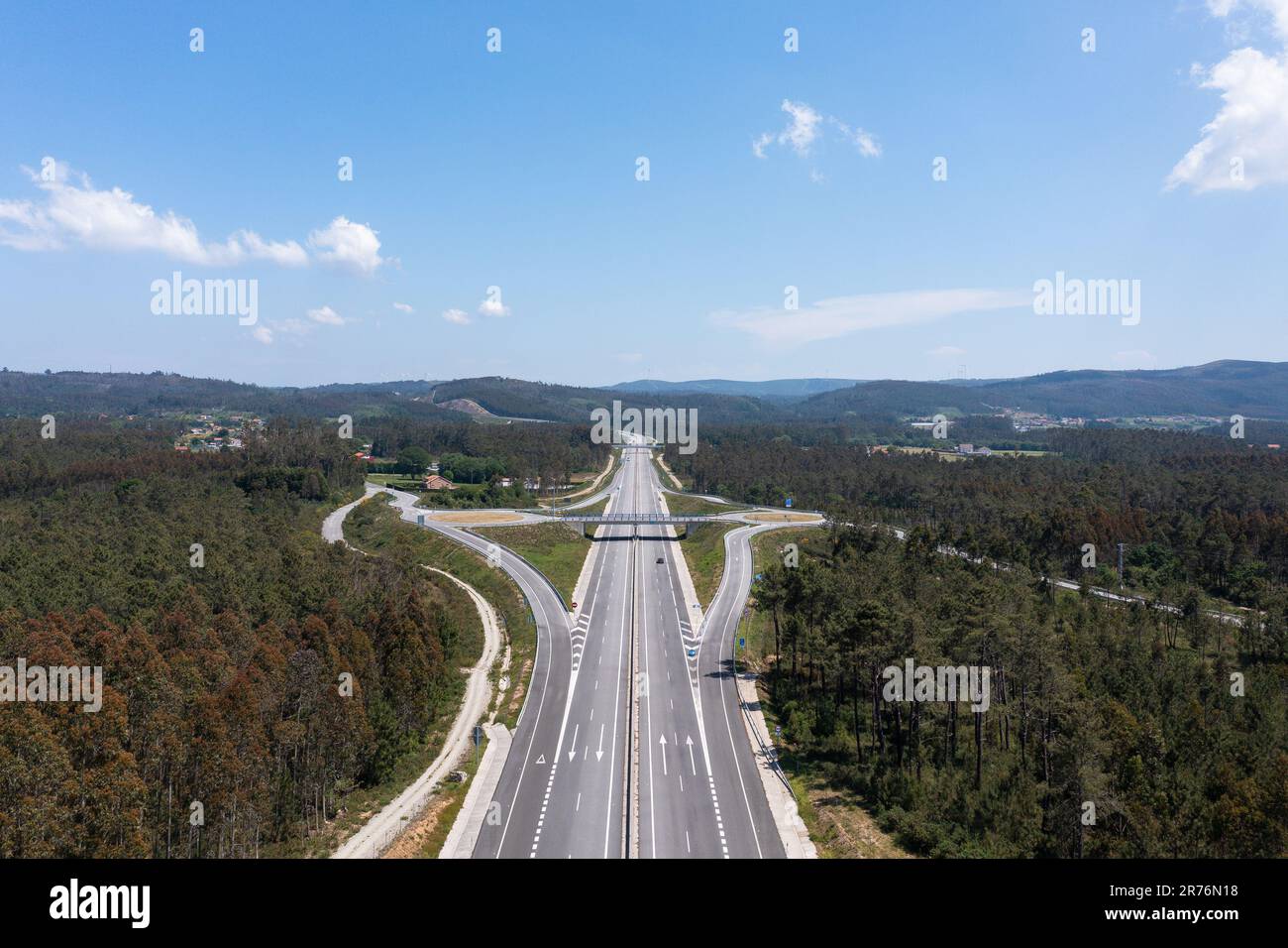 Top view aerial view of exit points from two roundabouts linked by a ...
