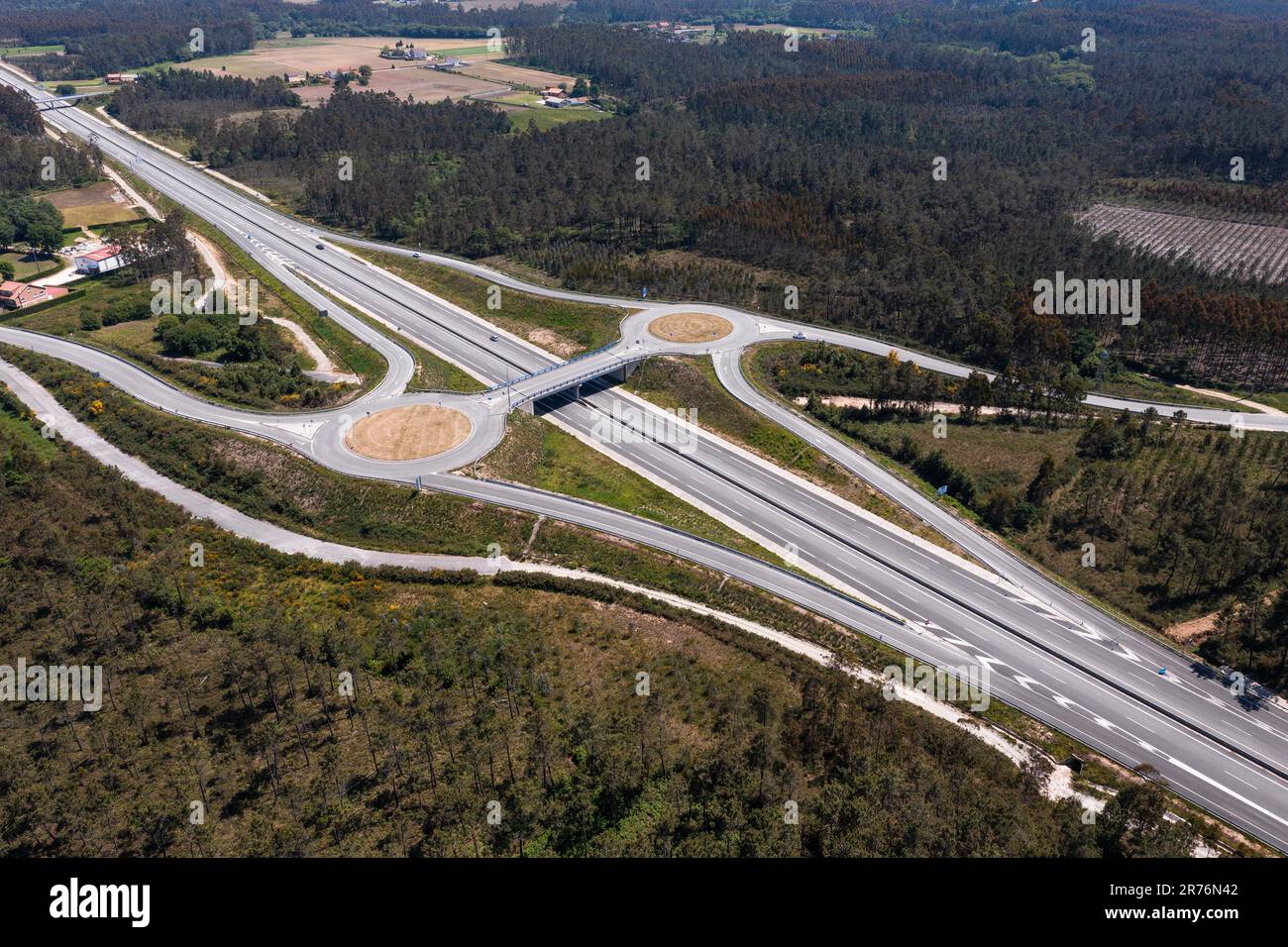 Top view aerial view of exit points from two roundabouts linked by a ...