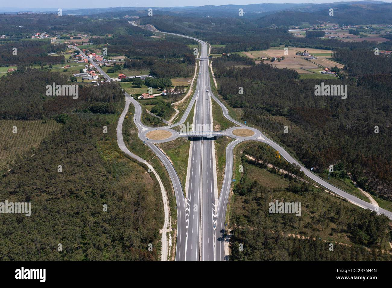 Top view aerial view of exit points from two roundabouts linked by a ...