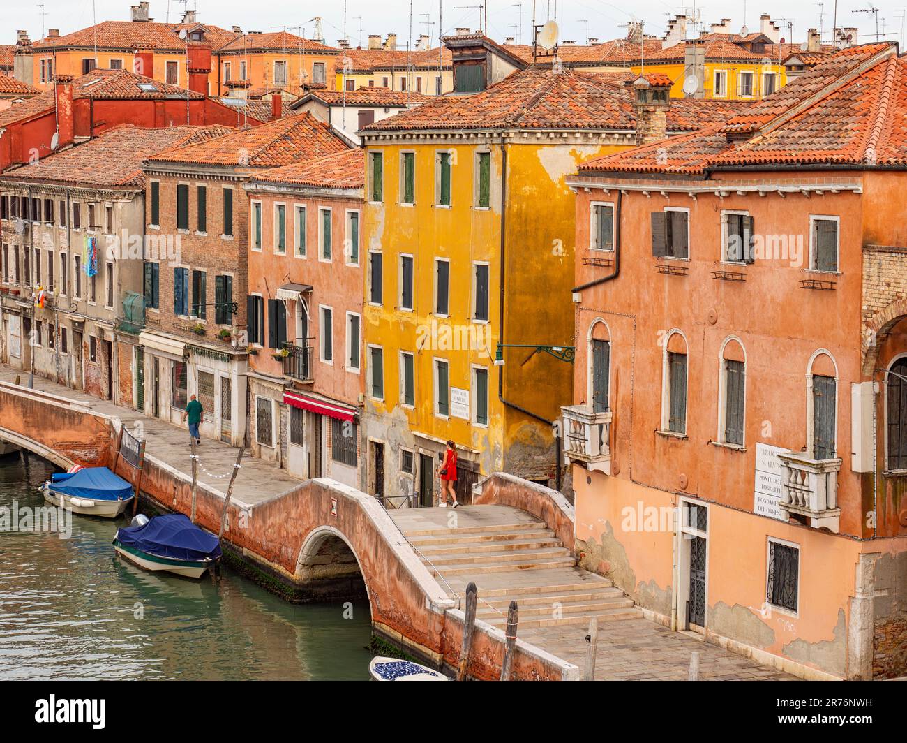 View of an alley of Venice (the writes on the wall are the names of the ...