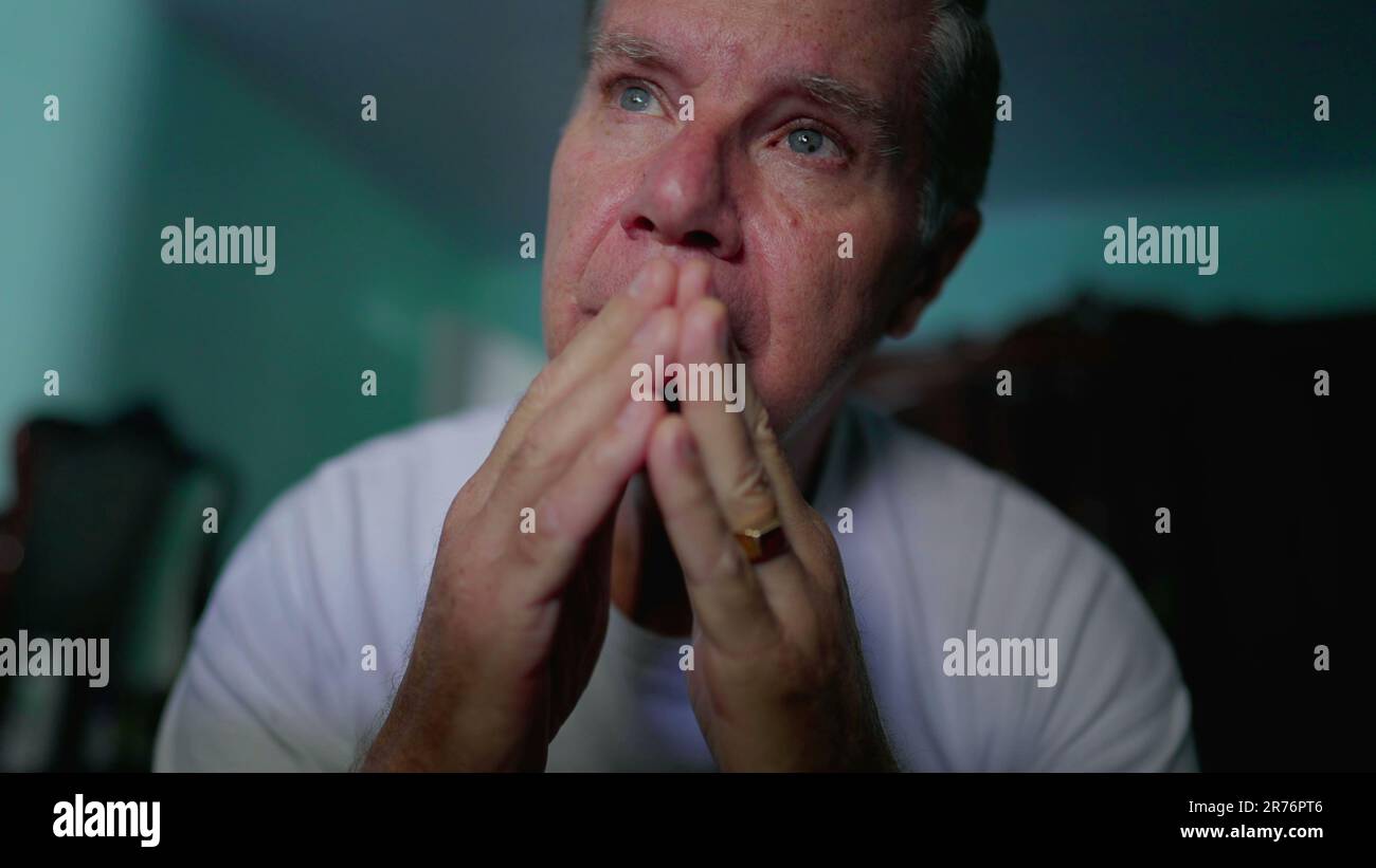 Close-up of a middle aged man suffering from headache, older person ...