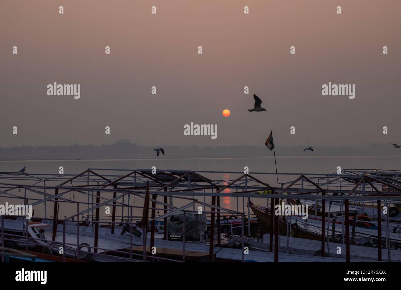 Varanasi: Boating in Varanasi, Wooden boats parked at river banks of ...