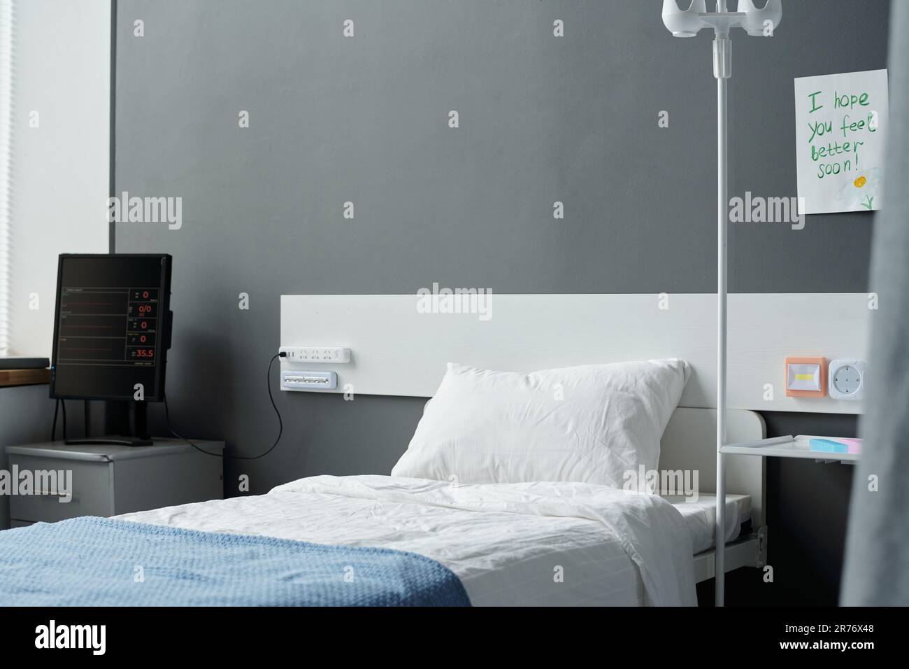 Empty hospital ward with bed for sick patient surrounded by such ...