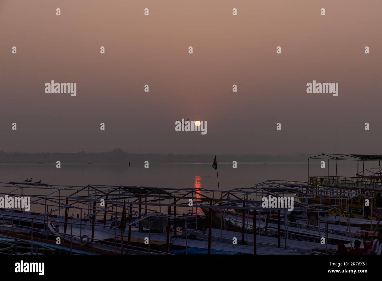 Varanasi: Boating in Varanasi, Wooden boats parked at river banks of ...