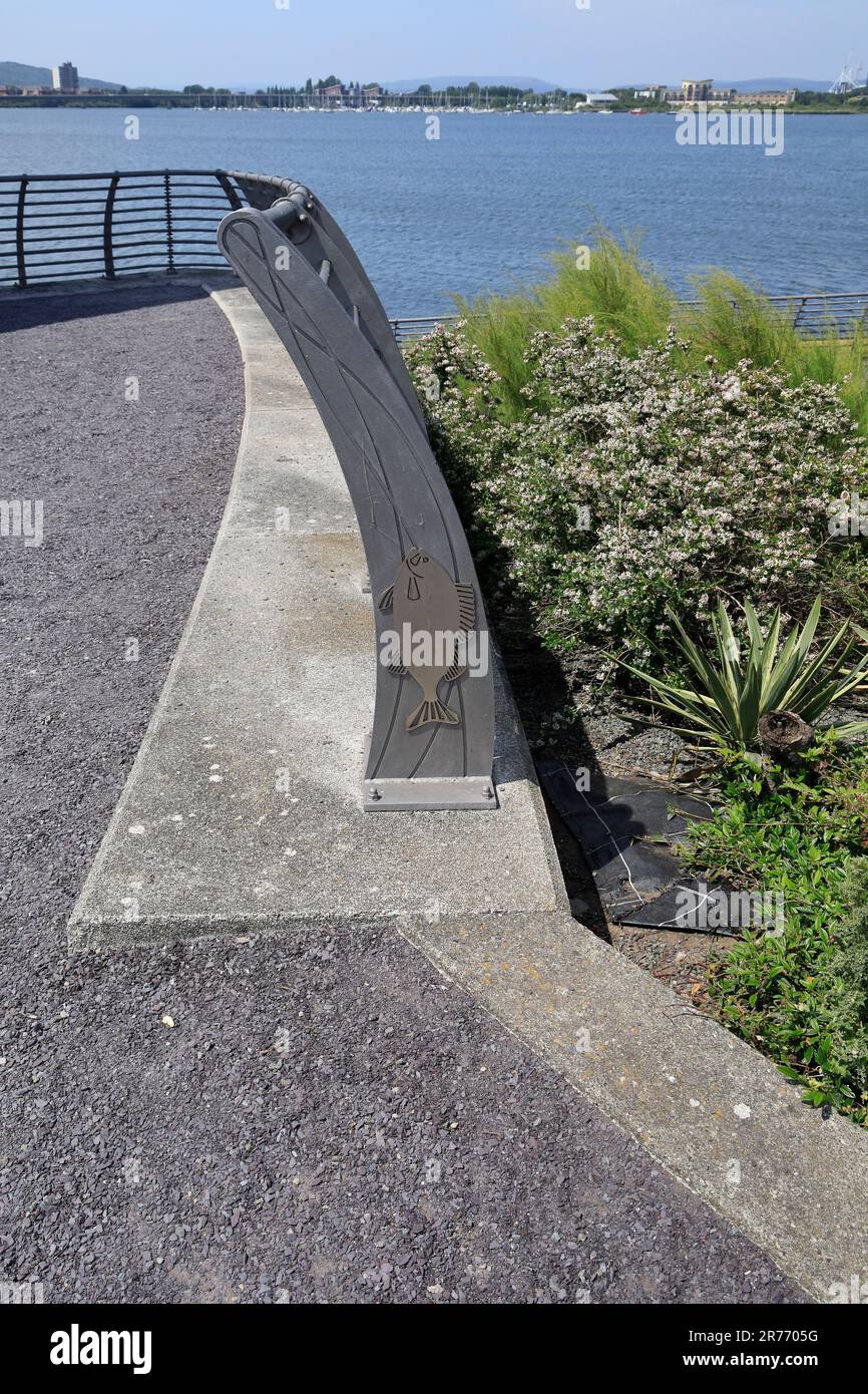 Fish artwork detail on railings, Cardiff Bay Barrage. . June 2023 ...