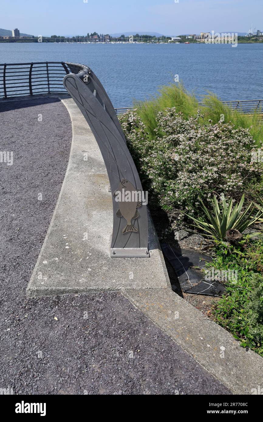 Fish artwork detail on railings, Cardiff Bay Barrage. . June 2023 ...