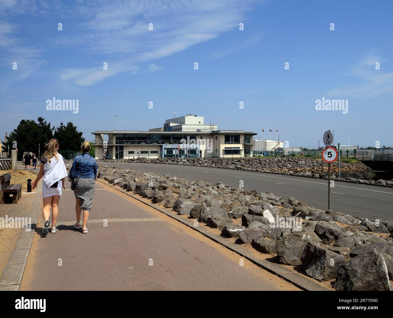 Two women walking along barrage, coming up to ABP Offices (Associated ... Two women walking along barrage, coming up to ABP Offices (Associated ...