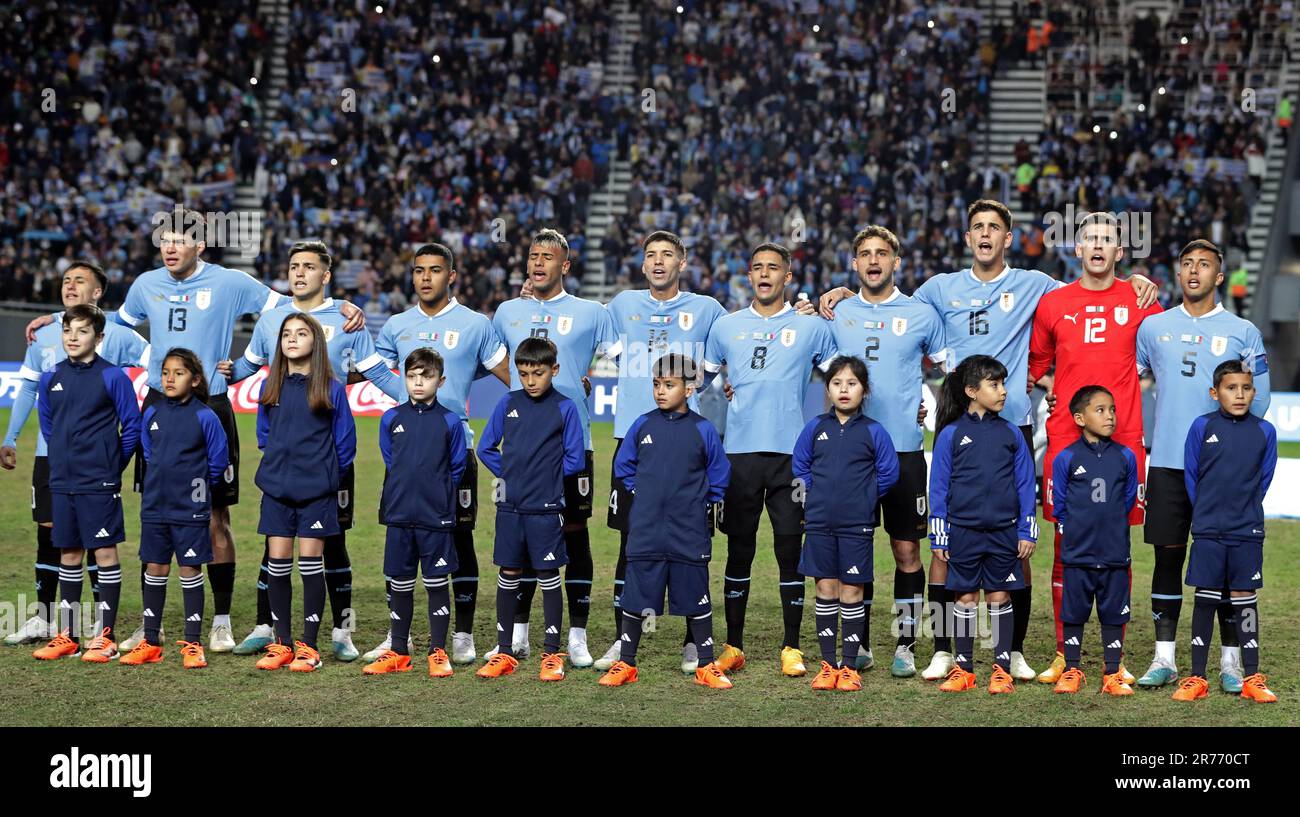 Uruguay’s footballers sing the national anthem before the Argentina ...