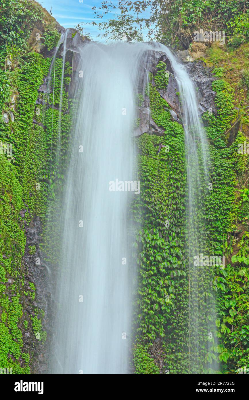 Image of a waterfall with motion blur during daytime Stock Photo - Alamy