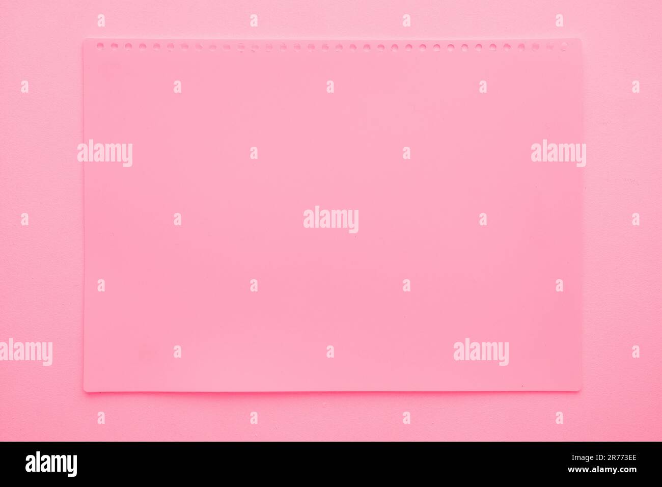 Blank title page from a pink notepad on a pink background. Place to ...