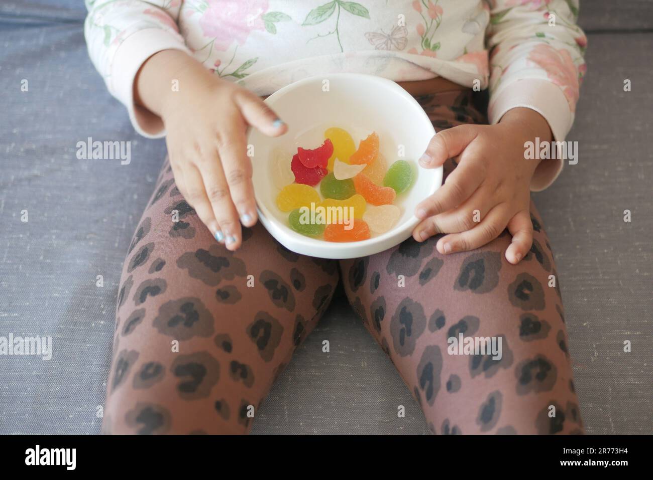 Child hand pick candy sweet hi-res stock photography and images - Alamy