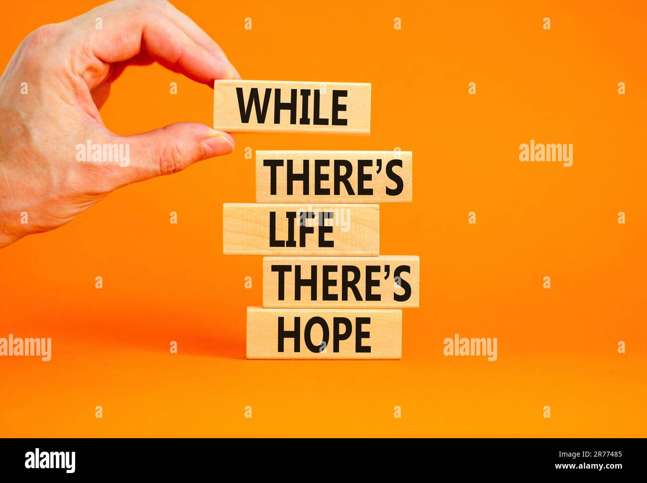 Life and hope symbol. Concept word While there is life there is hope on ...