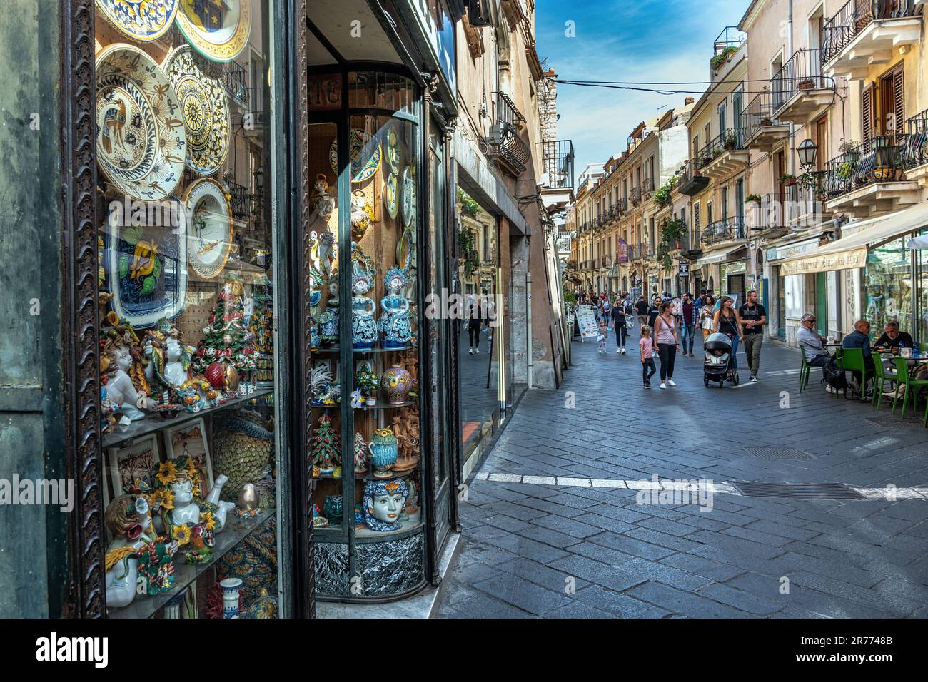 Glimpses of the buildings that overlook the main street of the tourist ...