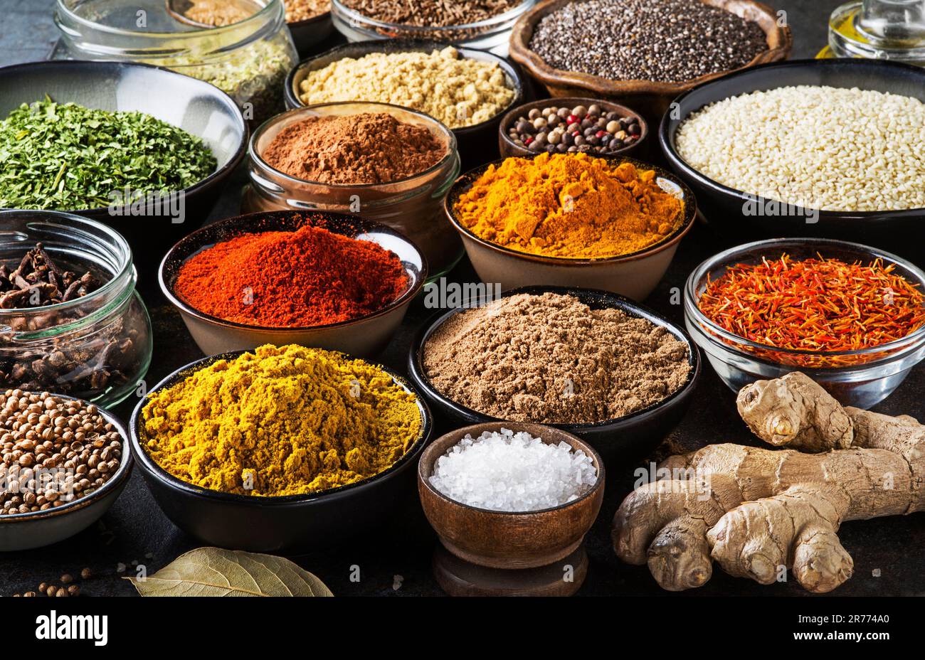 Colorful herbs and spices for cooking meal. Indian and Asian spices ...
