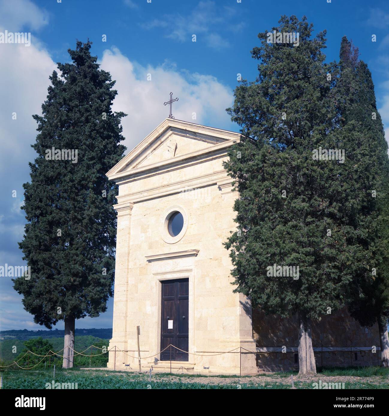 View on the Vitaleta Chapel and the surrounding hills of the Orcia ...