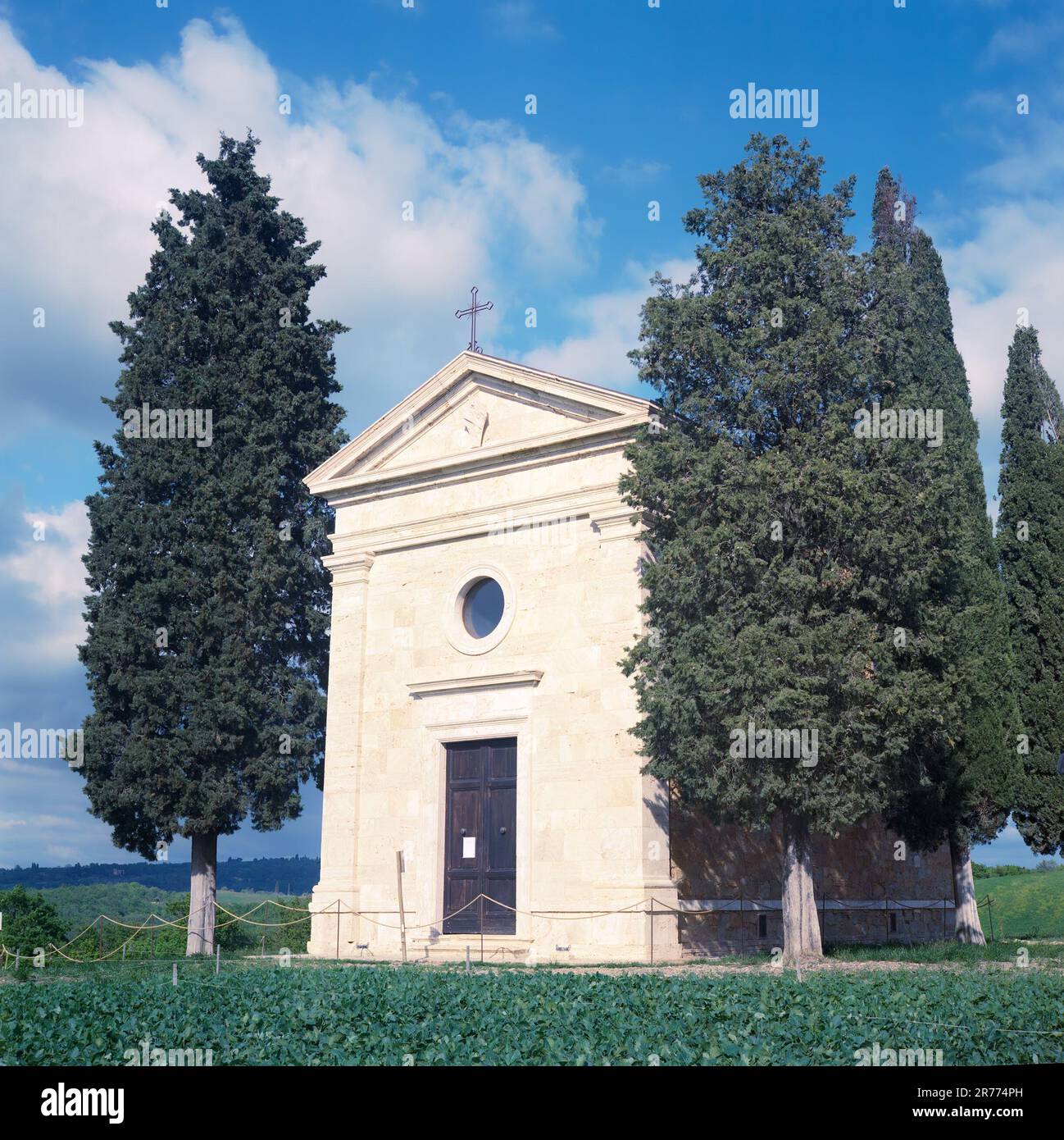 View on the Vitaleta Chapel and the surrounding hills of the Orcia ...