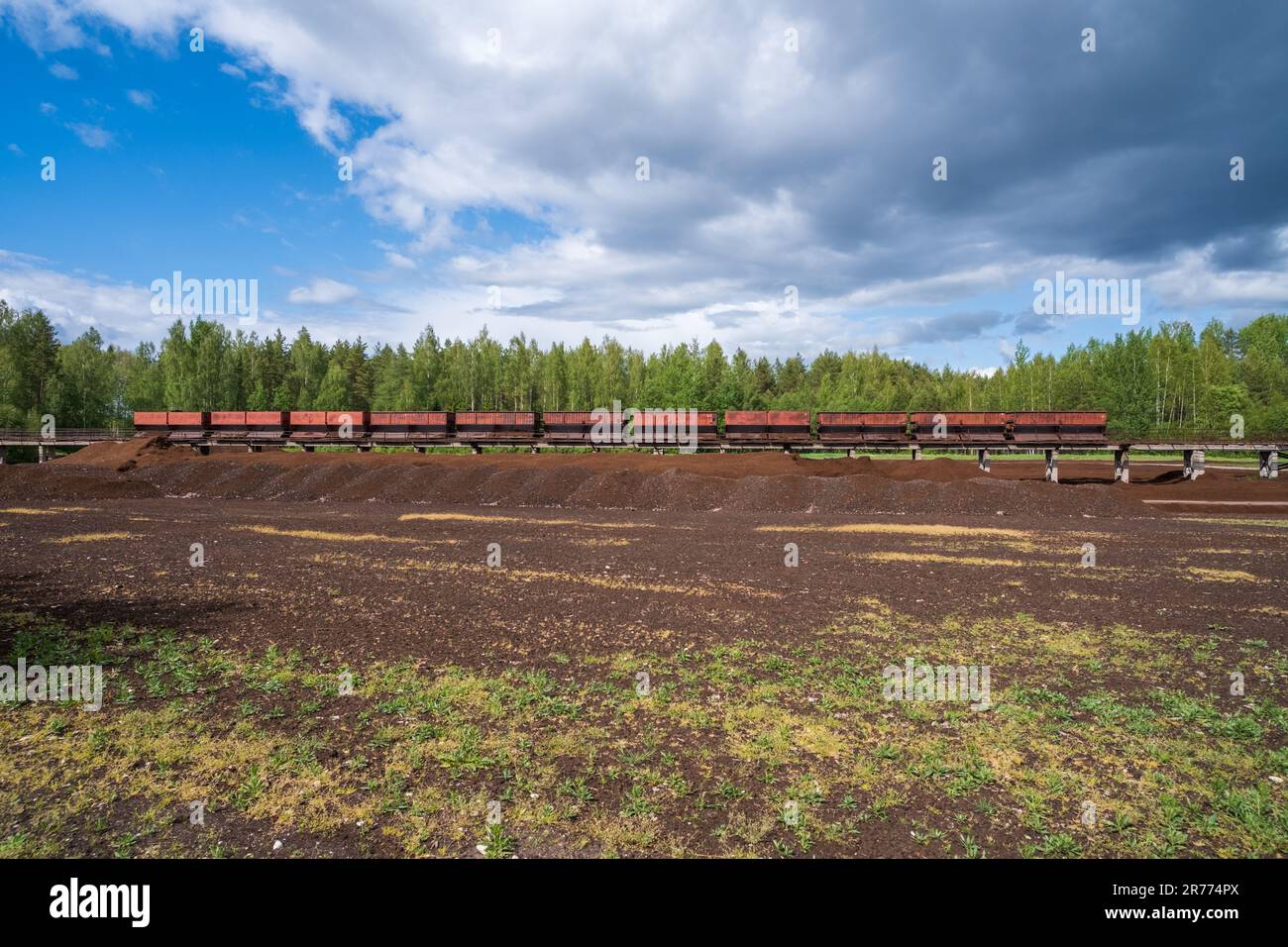 peat transport wagons at the loading point. Raised platform for loading ...