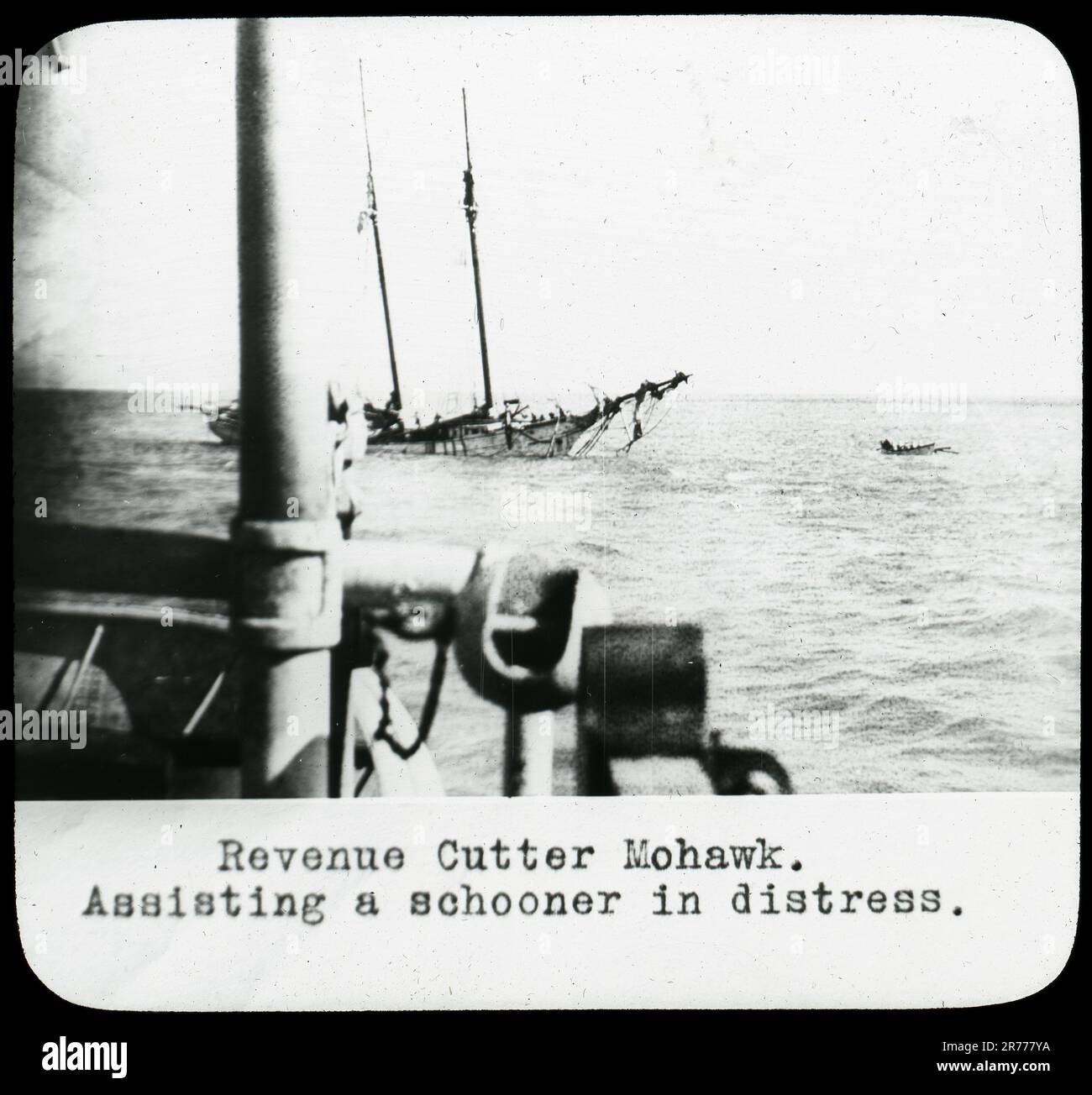 Revenue Cutter Mohawk, Assisting a schooner in distress. Photographs of ...