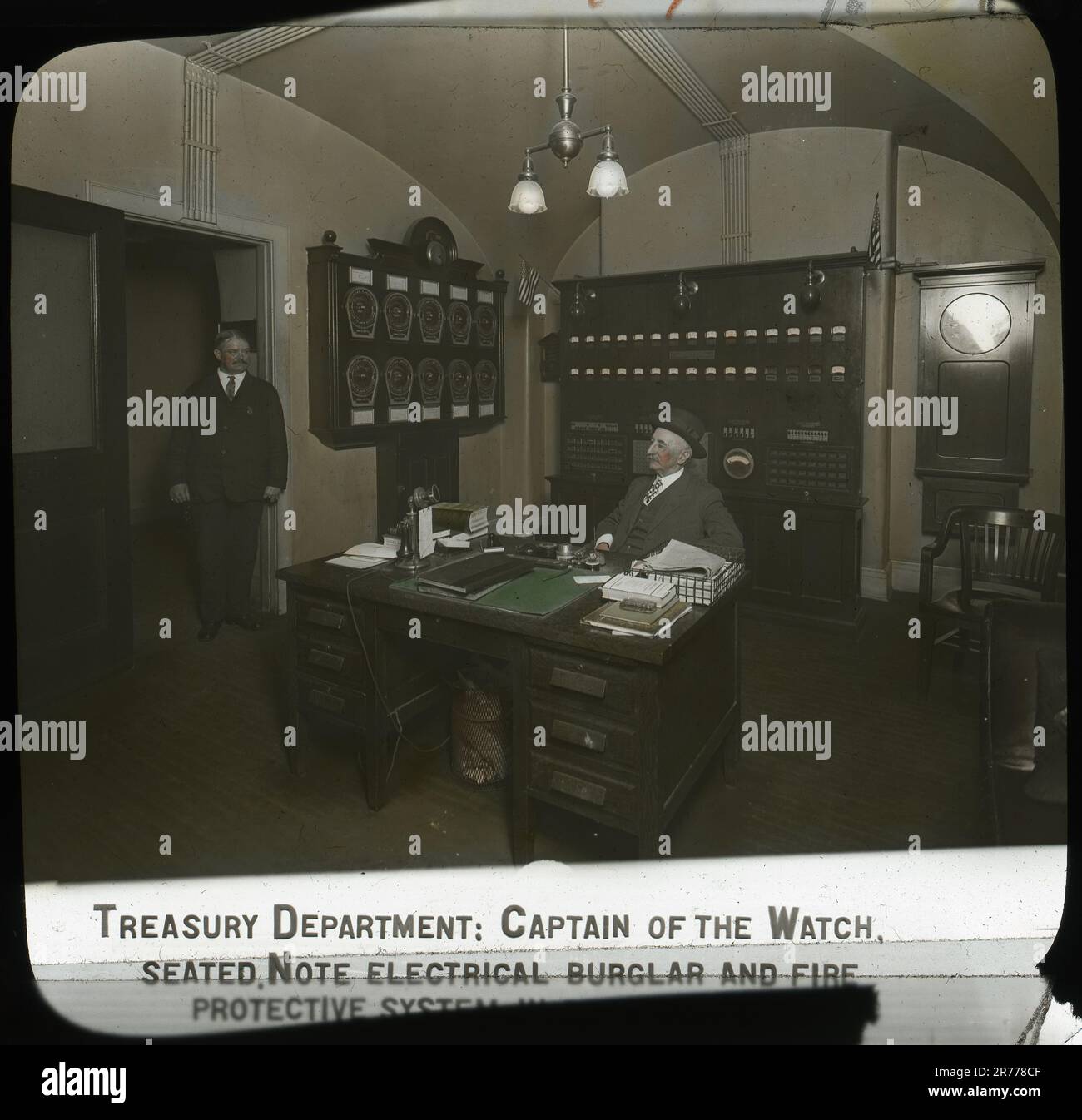 Treasury Department: Captain of the Watch. Seated, note electrical ...