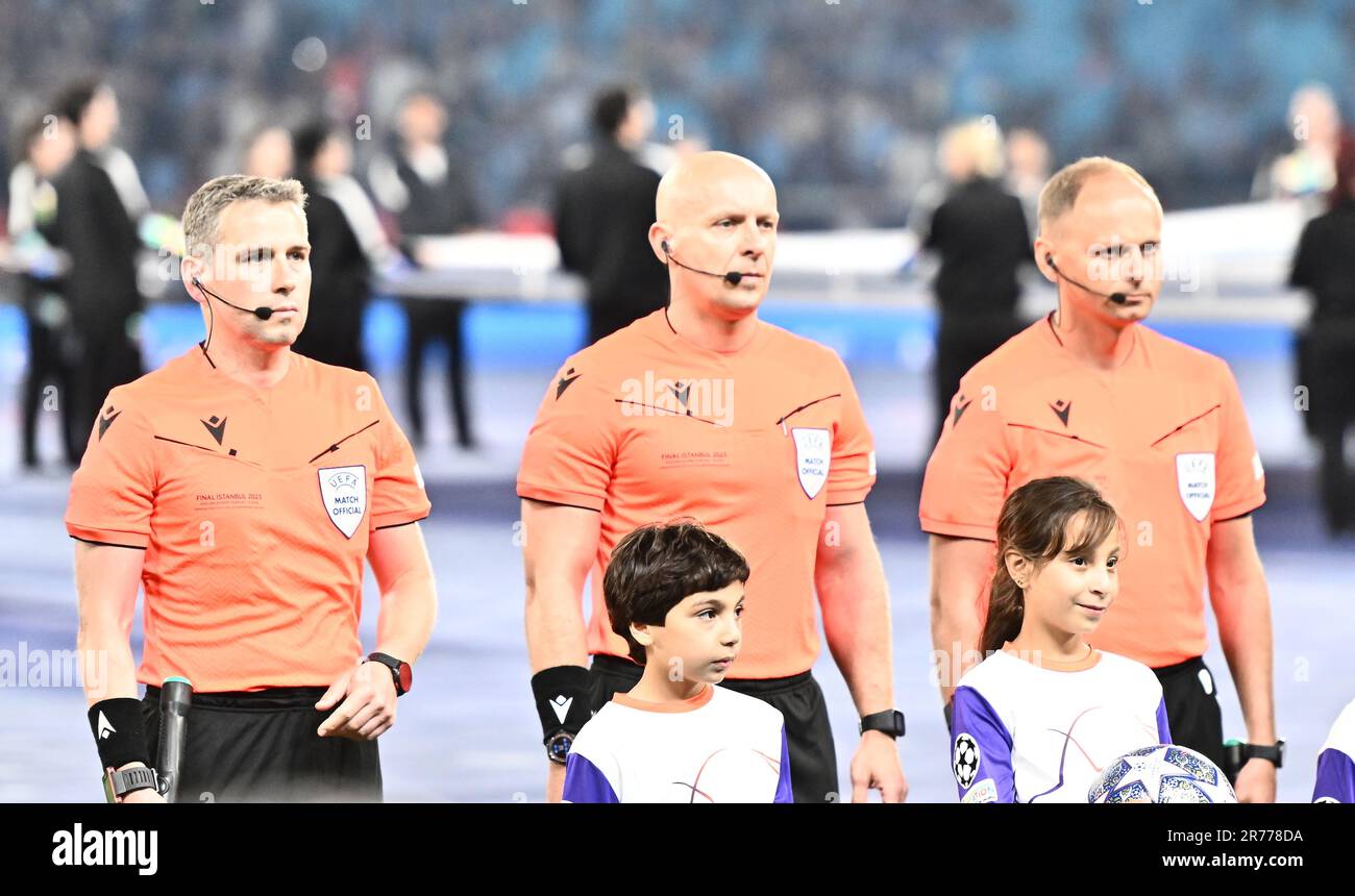 ISTANBUL, TURKEY - JUNE 10: referee Szymon Marciniak and Pawel ...