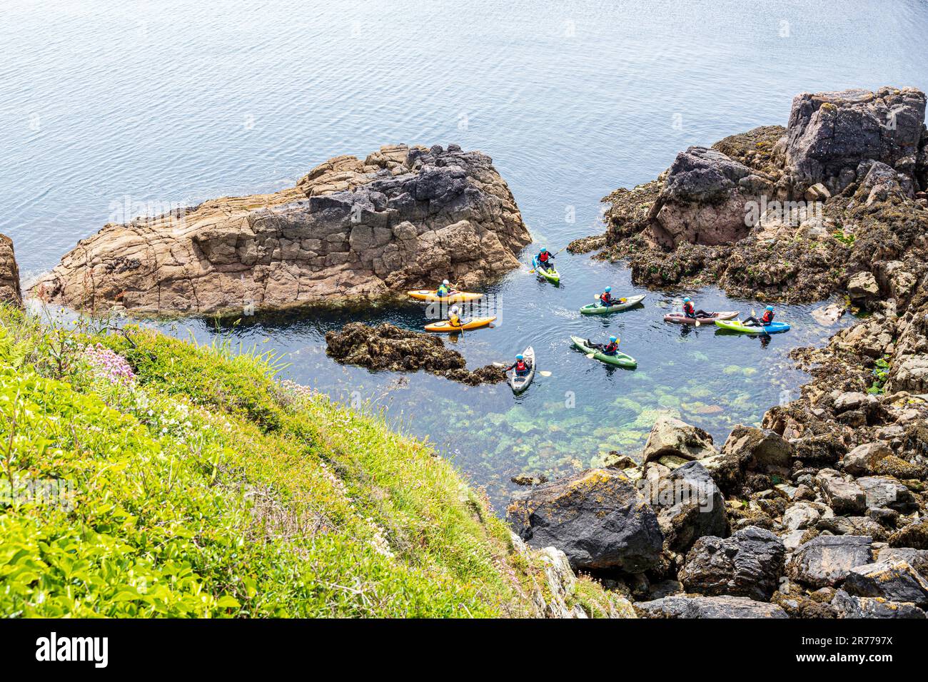 Canoeists taking a rest at St Non's Bay on the St David's peninsula in ...