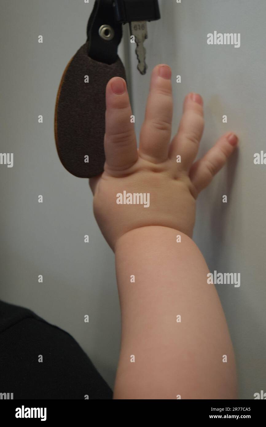 baby hand reaching for keys Stock Photo - Alamy