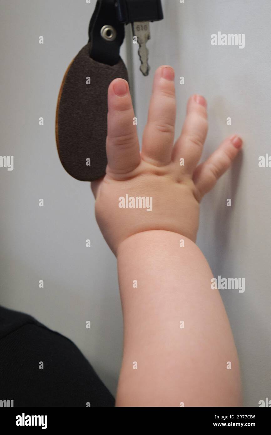 baby hand reaching for keys Stock Photo - Alamy