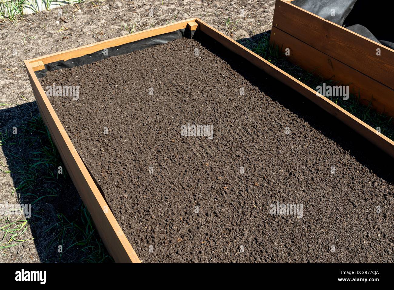 Wooden crates for vegetables lined with agrotextile from the inside and ...