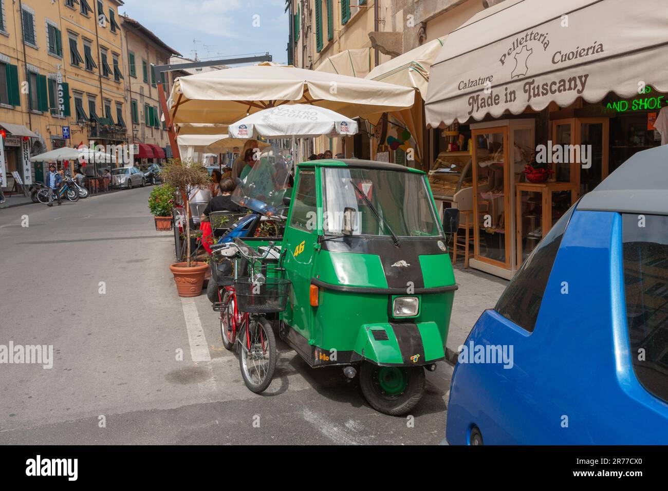 Pisa Italy - April 24 2011; Transportation on Urban streets lined by ...
